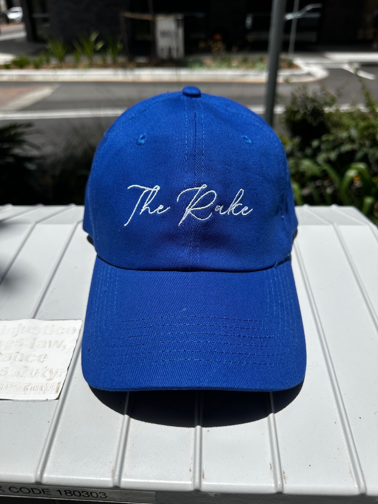 The Rake Logo Dad Cap in Bright Blue